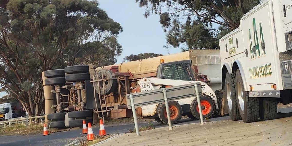 Truck rollover at busy roundabout - bay 93.9
